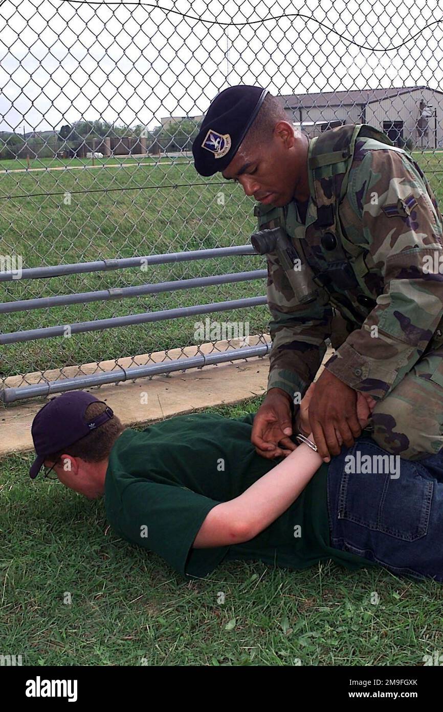 US Air Force AIRMAN First Class Jamion Speed (Top), of the Pacific Air ...