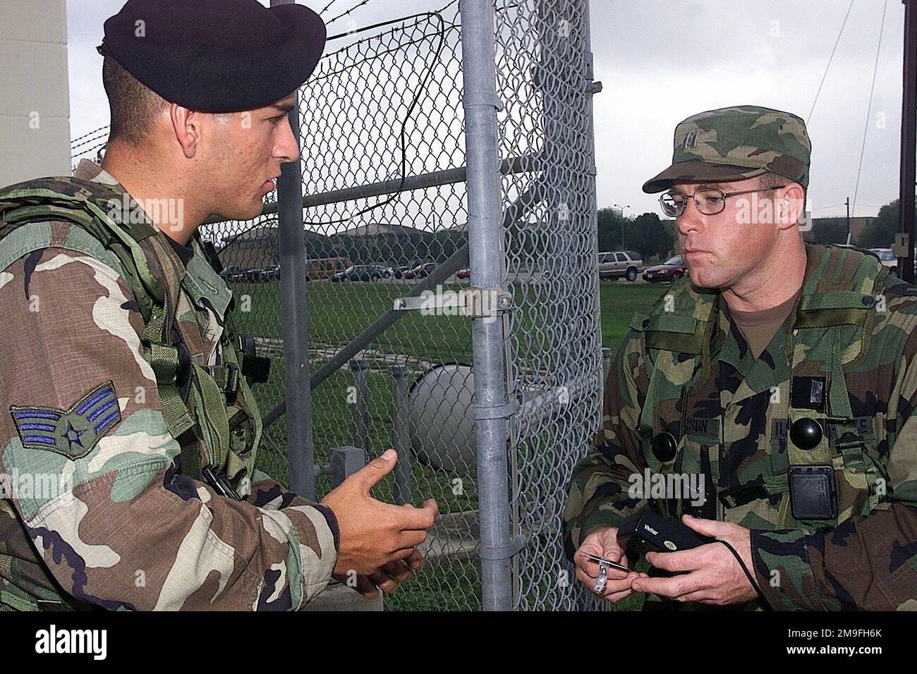Air National Guard SENIOR AIRMAN Andrew Moyachecks an identification ...