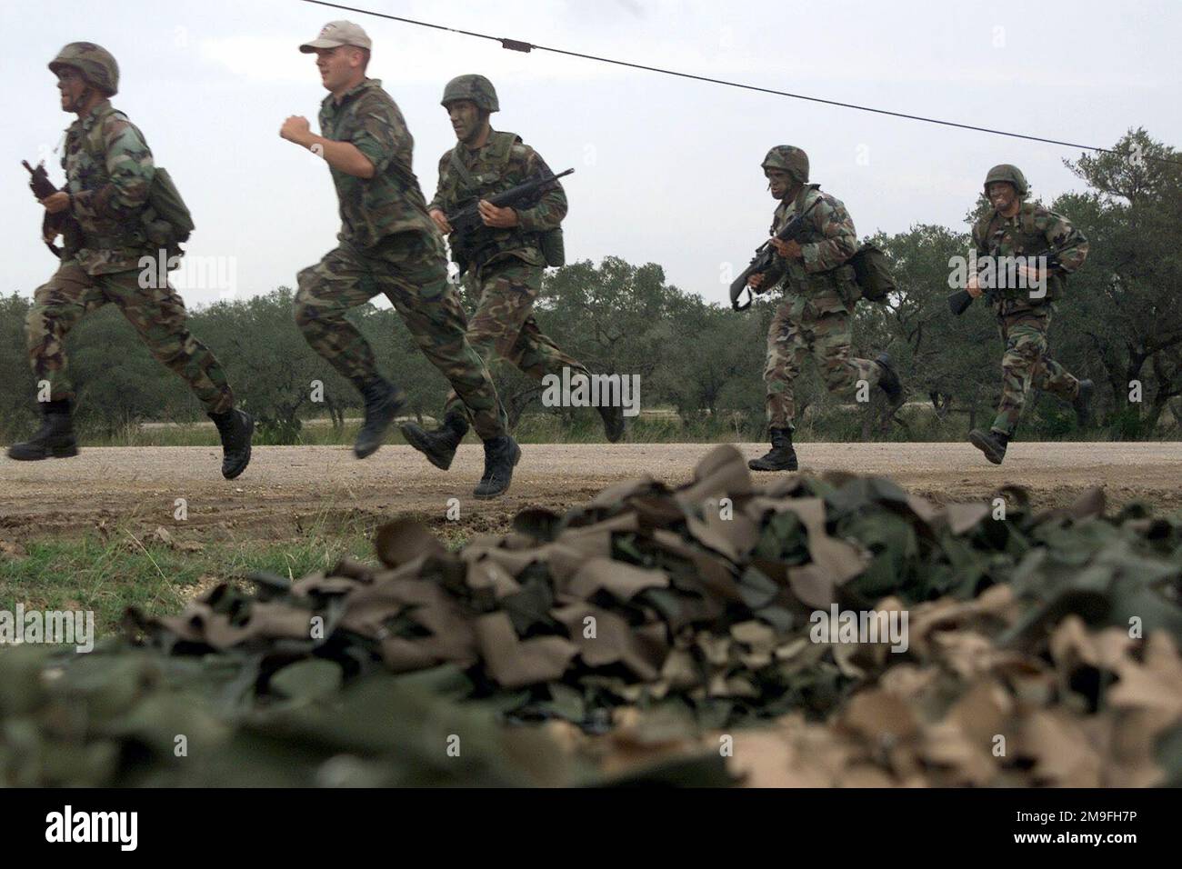 A low angel view of Personnel from the US Air Force Pacific Air Command ...