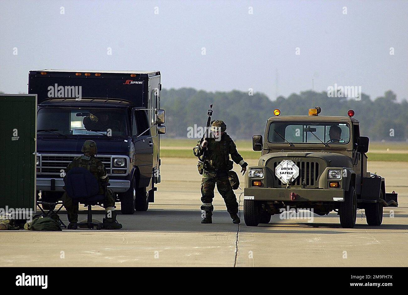 Members of the 136th Security Forces Squadron, Fort Worth, Texas, check ...
