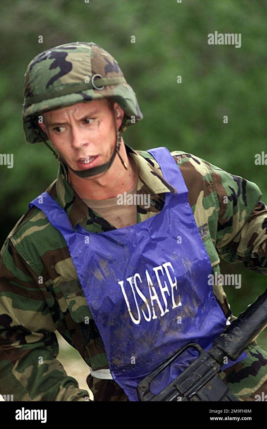 United States Air Forces in Europe's SENIOR AIRMAN Ronald Helm rounds ...