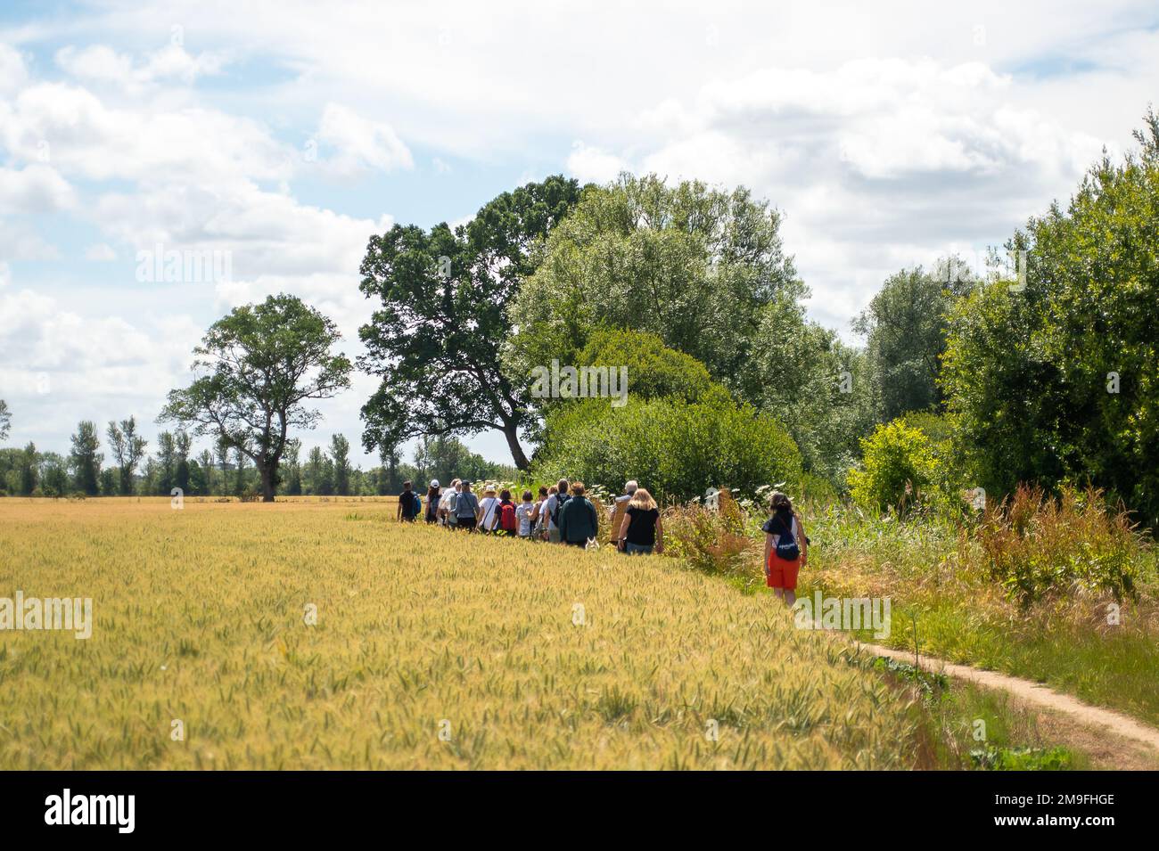Cookham, Berkshire, UK. 26th June, 2022. Walkers out on a public ...