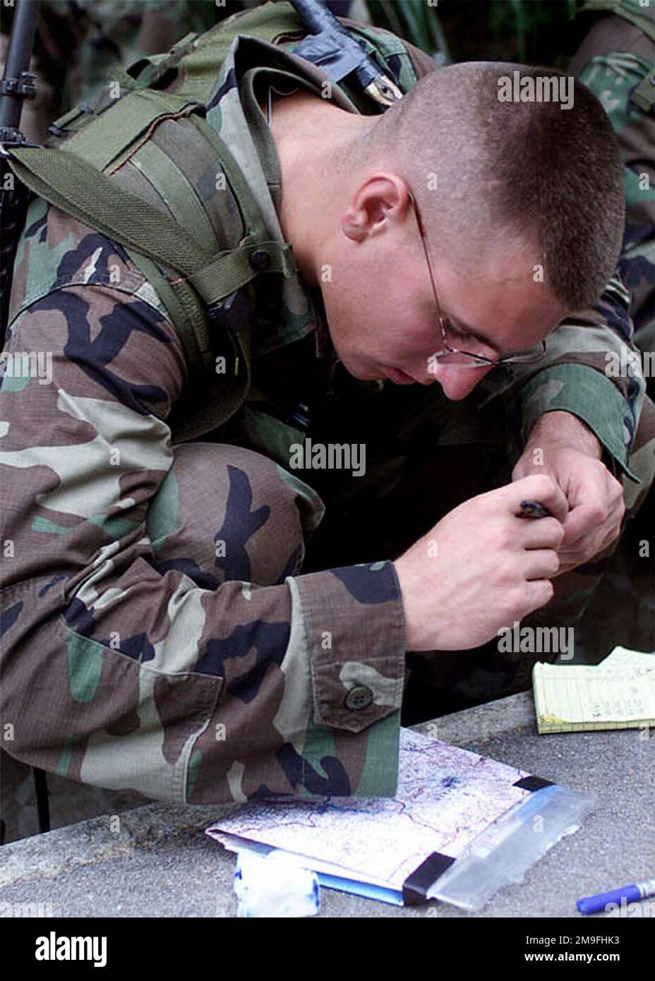 US Marine Corps Corporal (CPL), Michael L. Ford, a radio operator with ...