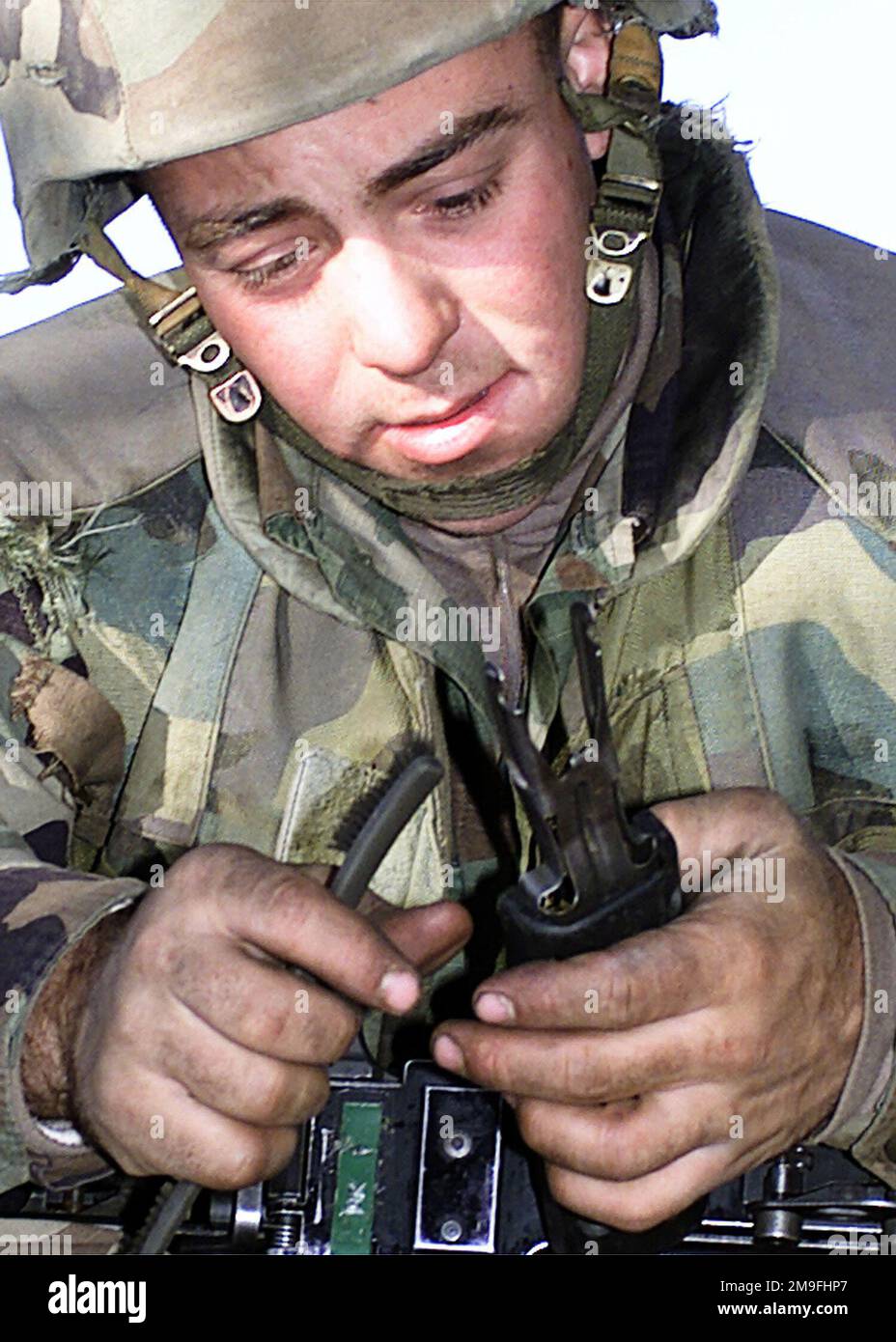 A close up of US Marine Corps Lance Corporal (LCPL), Travis Bach, 3rd ...