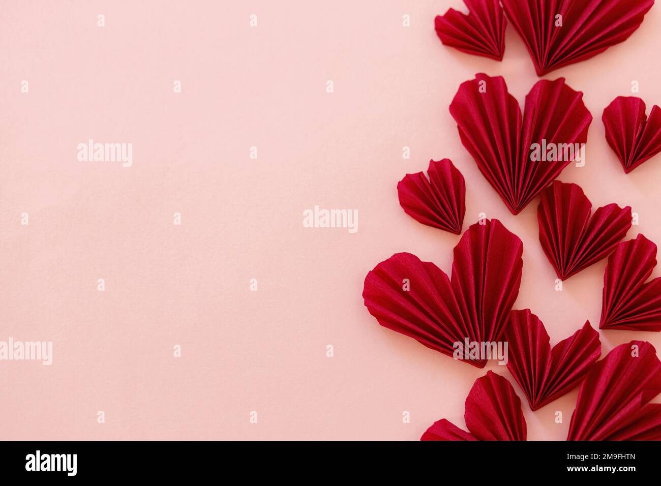 Happy Valentine's day! Stylish red hearts flat lay on pink paper ...