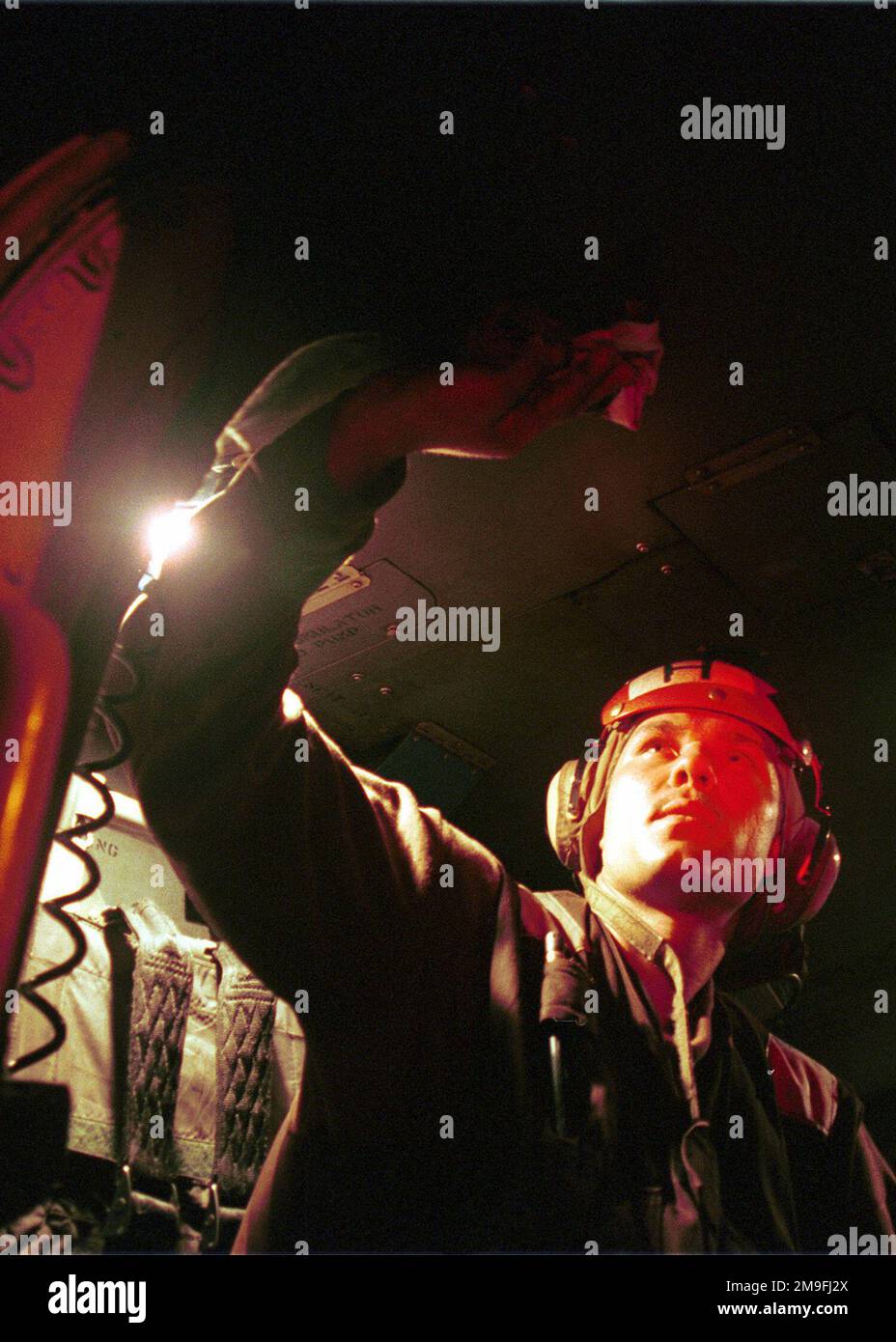 US Navy Aviation Structural Mechanic Daryl Richardson cleans the ...