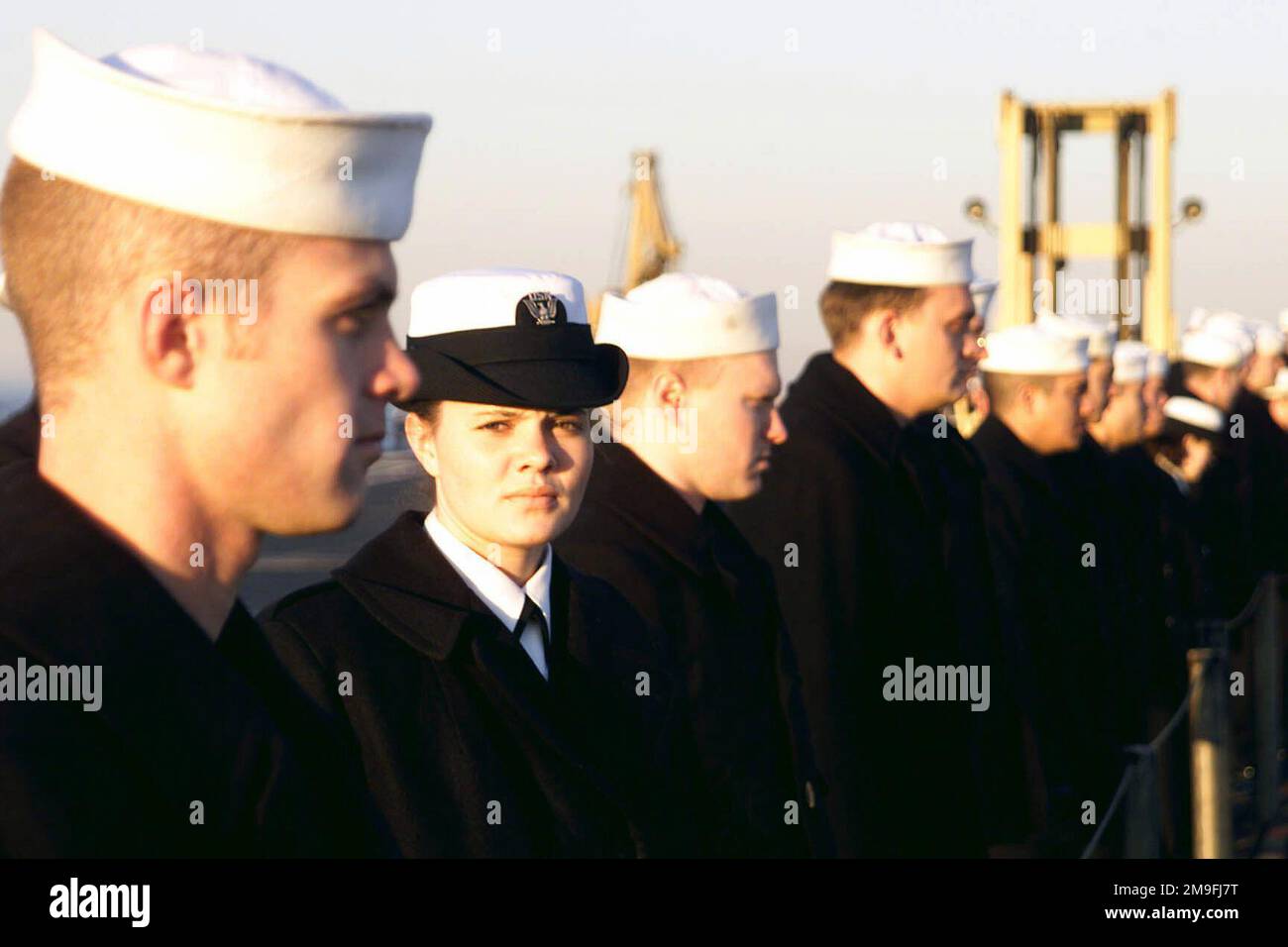 US Navy Disbursing Clerk SEAMAN Amy Heinze (looking at camera) and ...