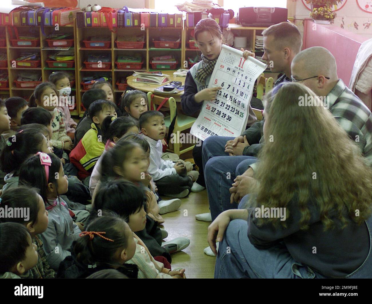 Korean orphans learn days of the week in English during the Community ...