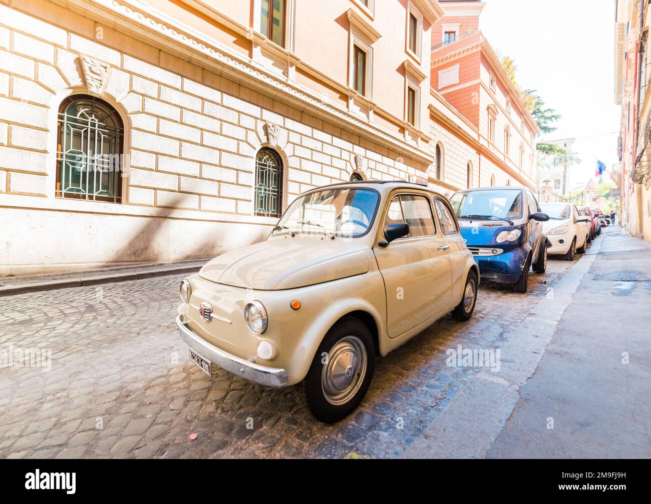 ROME, ITALY - JUNE 30, 2019: Small vintage car on beautiful street in ...
