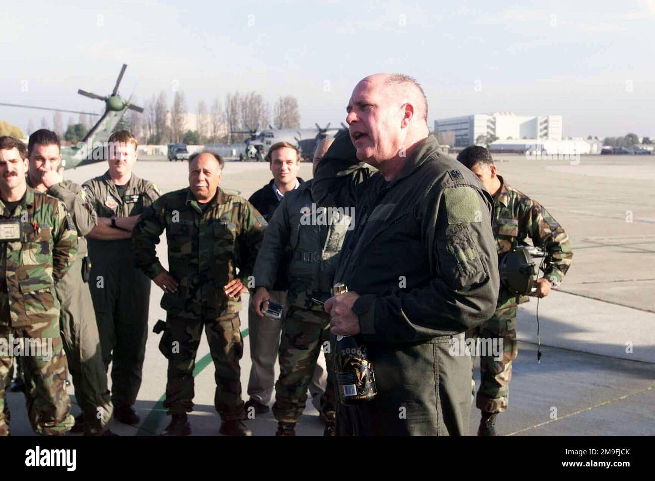 US Air Force Lieutenant Colonel Thomas Laut talks to his friends and co ...