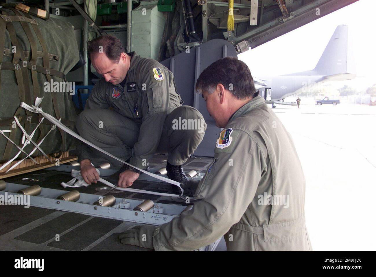 Pararescueman, US Air Force Technical Sergeant John Saftner (left) and ...