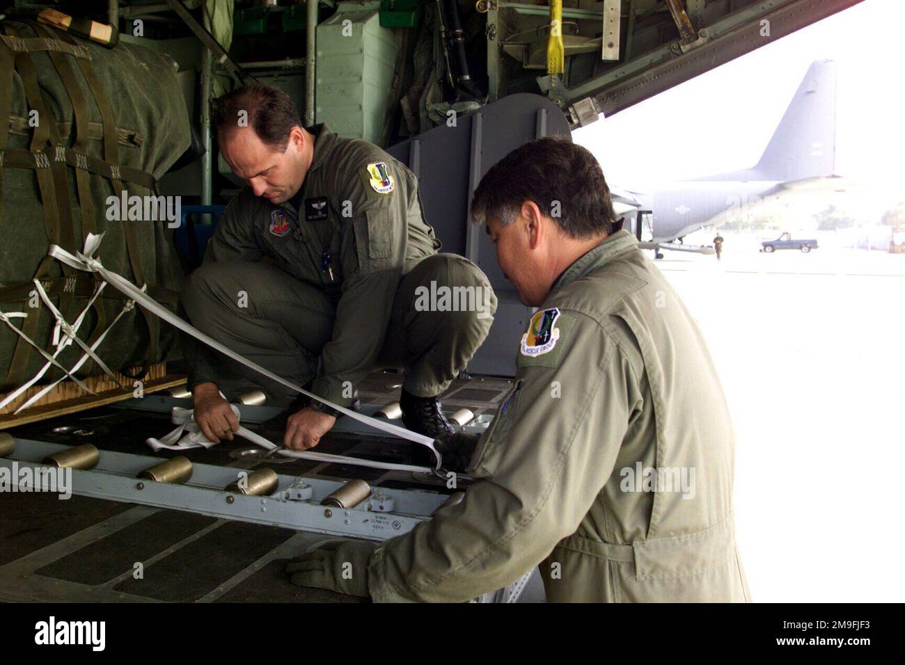 Pararescueman US Air Force Technical Sergeant John Saftner (left) and ...