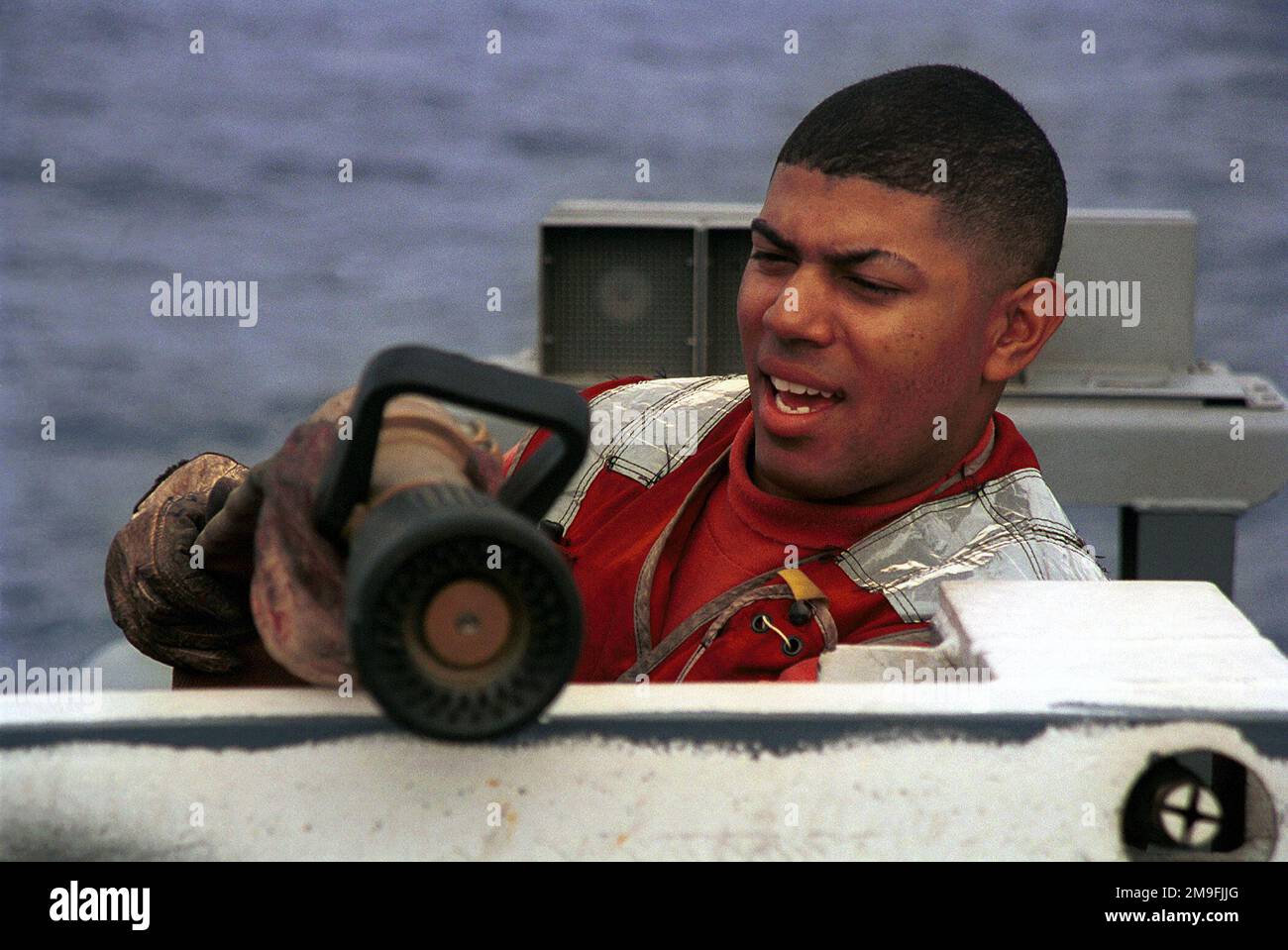 Aviation Boatswain's Mate Handler Third Class Demetrius Williams hoists ...