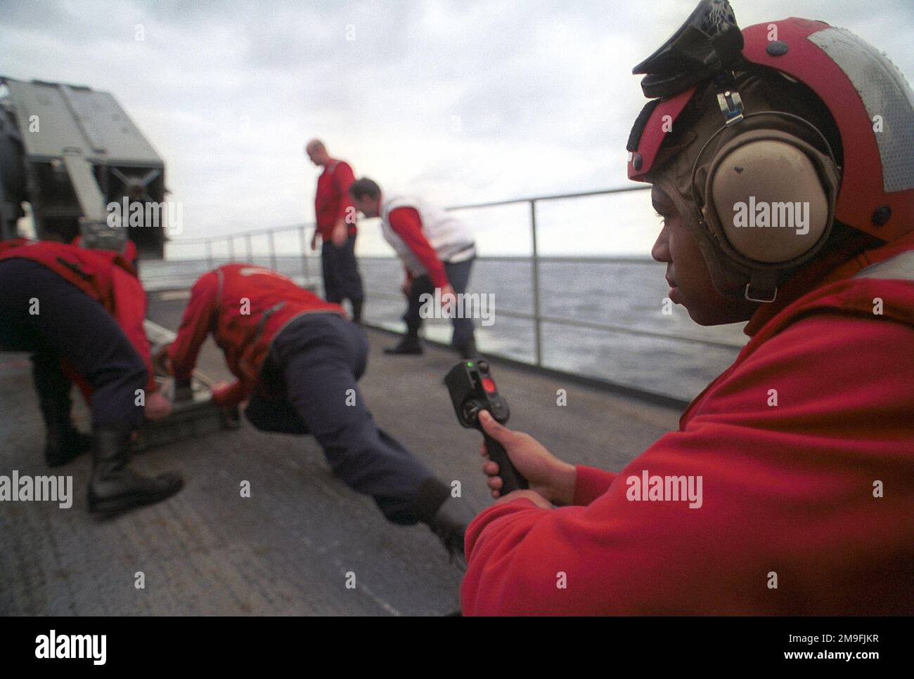 Fire Controlman Second Class Val Funderburk moves the NATO RIM-7M Sea ...