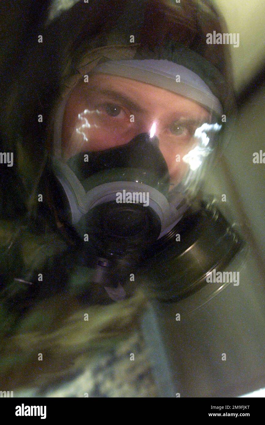 Aviation Storekeeper Third Class Craig Maycock dons a MCU-2/P Chemical ...