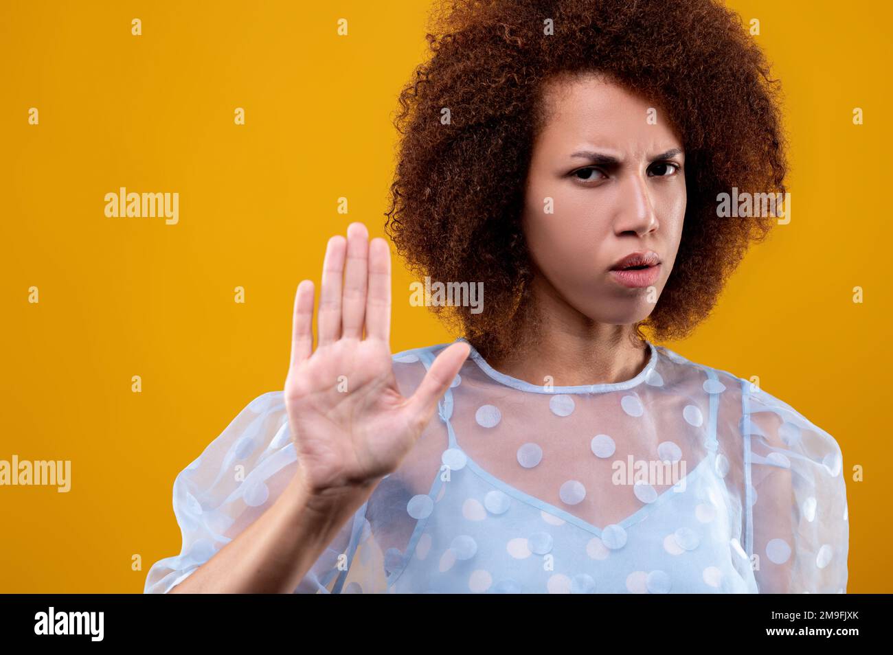 Strict looking woman hi-res stock photography and images - Alamy