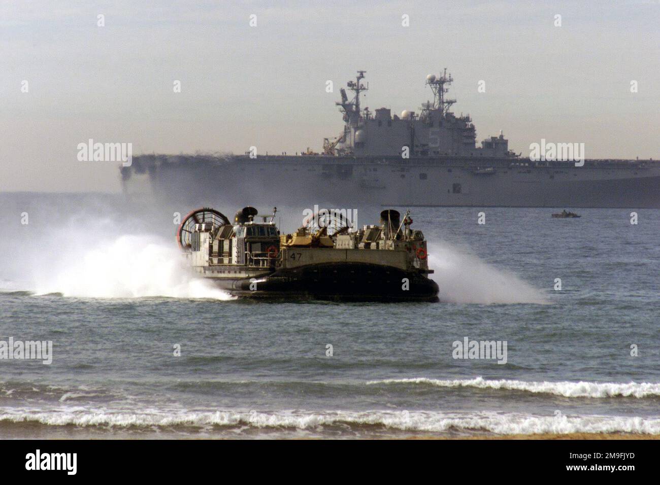 A Landing Craft Air Cushioned (LCAC) launched from the amphibious ...