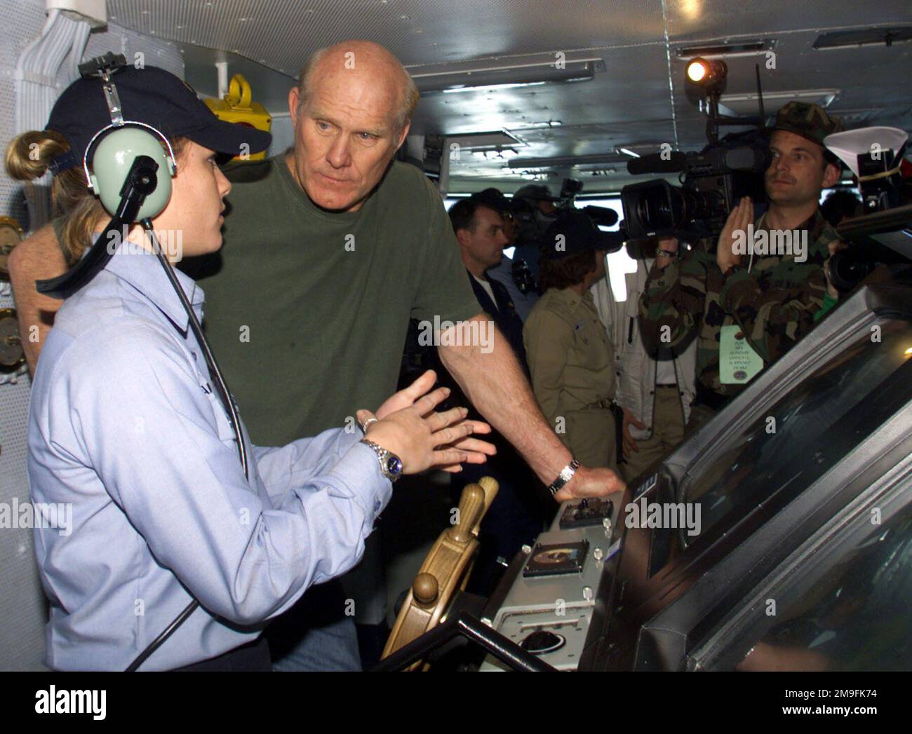 SEAMAN Blair C. Mammel explains her duties as a ship's Helmsman to Fox ...