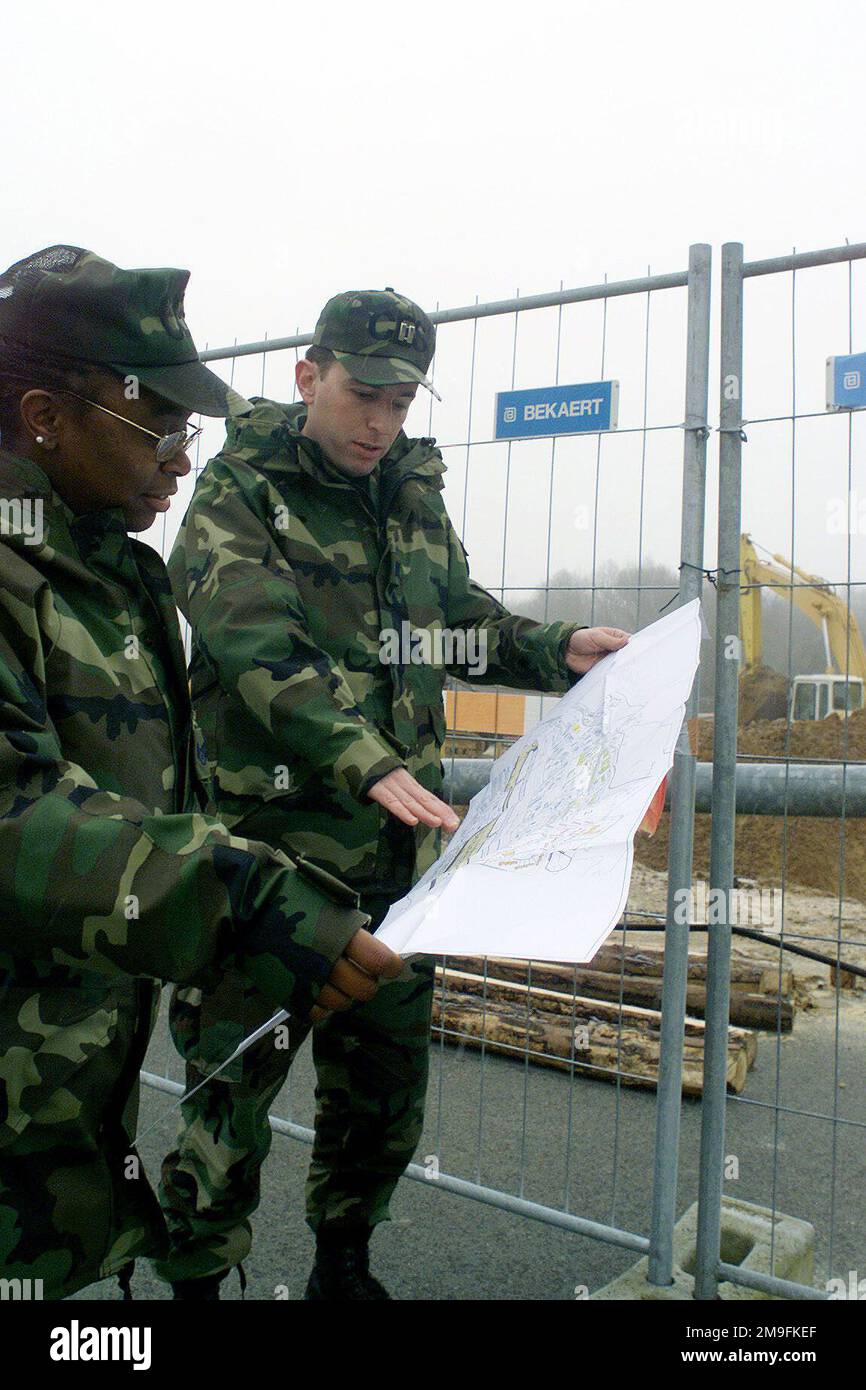 CHIEF of Design Construction, US Air Force Captain Michael Geer (center ...