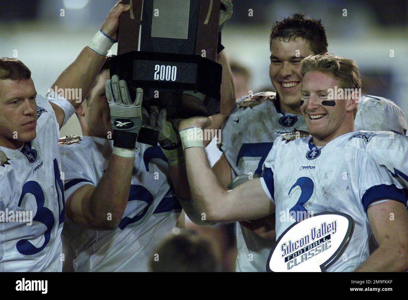 US Air Force Academy Falcons hold the Bowl Winners trophy at the ...
