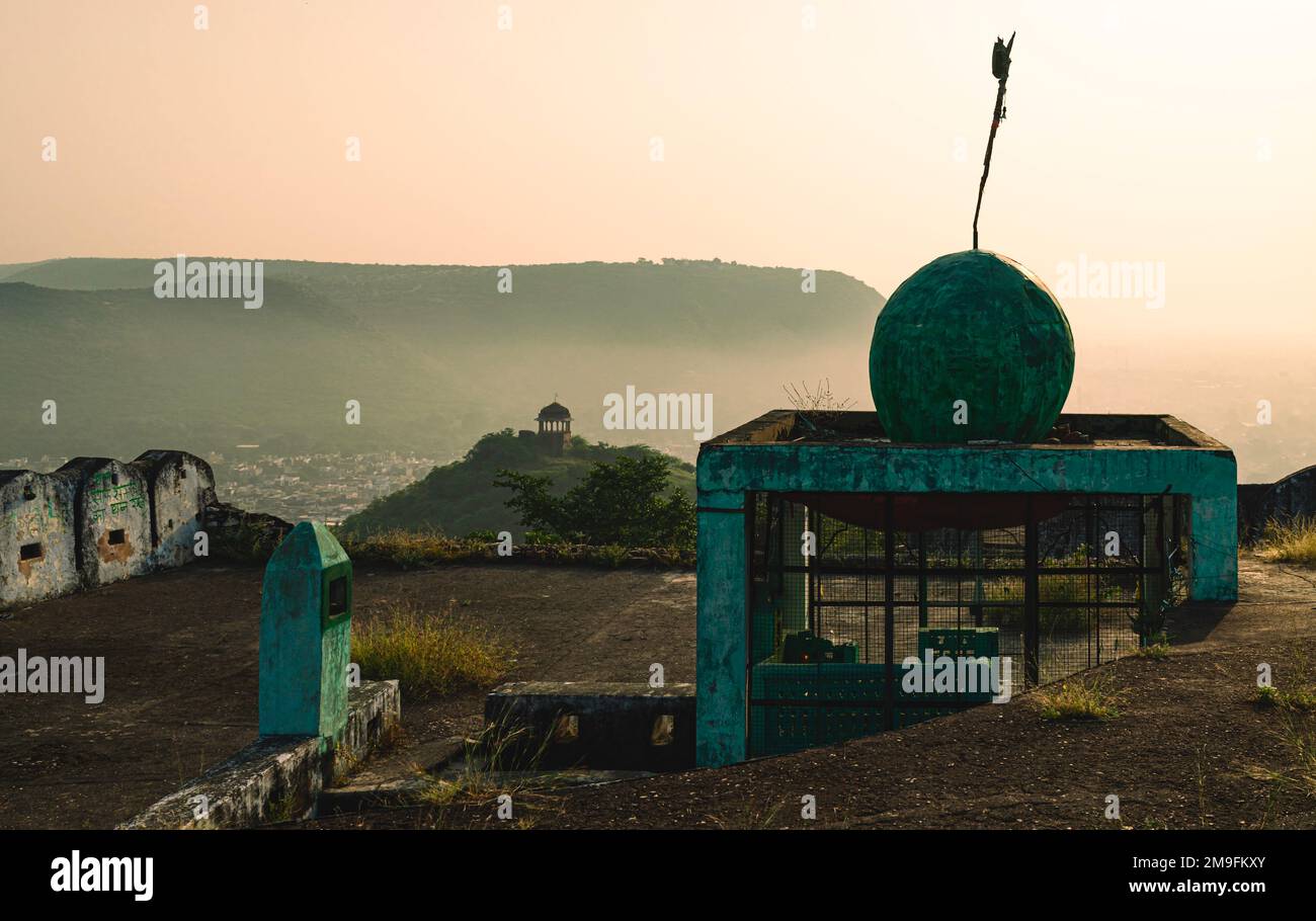 Sufi saint shrine overlooking a glimpse of town centre and Aravalli ...