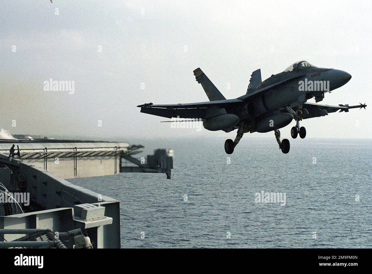 An F/A-18 Hornet aircraft from Marine Fighting Squadron Three Twelve ...