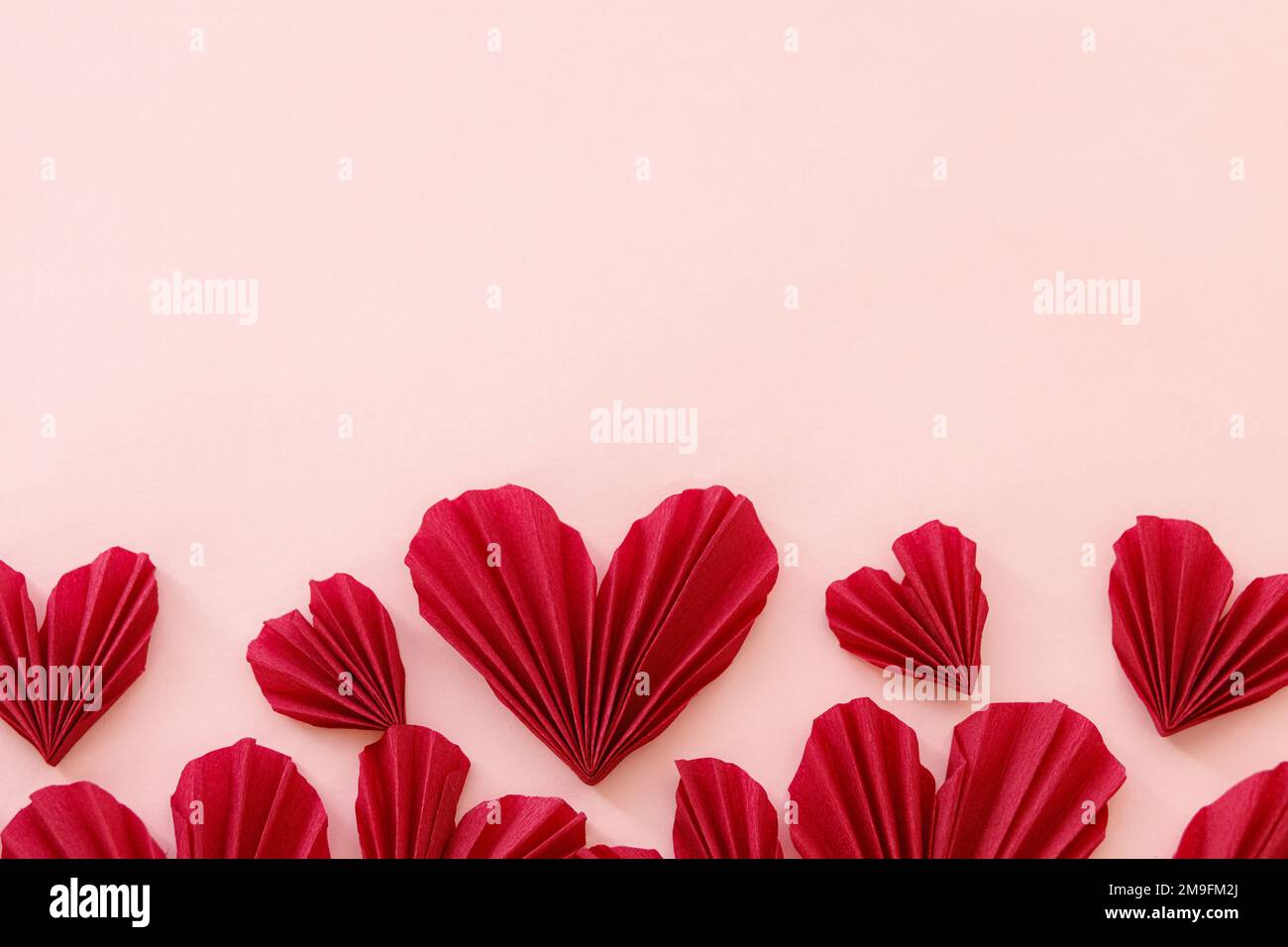 Valentines day flat lay. Stylish red hearts composition on pink paper ...