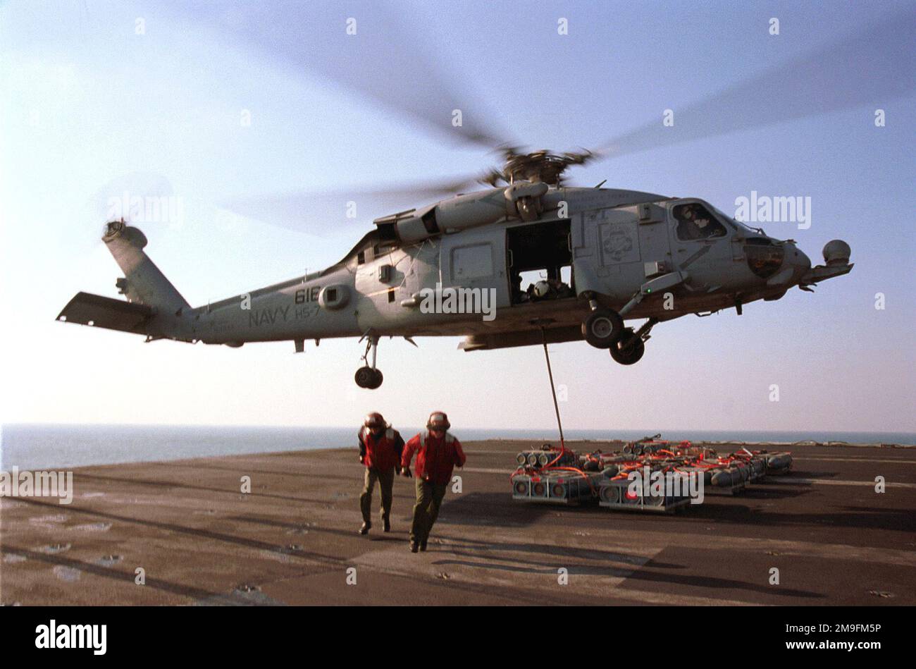 US Navy Aviation Ordnanceman Second Class Wayne Jones and US Navy ...