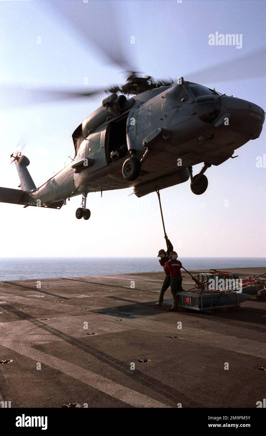 US Navy Aviation Ordnanceman Second Class Wayne Jones and US Navy ...