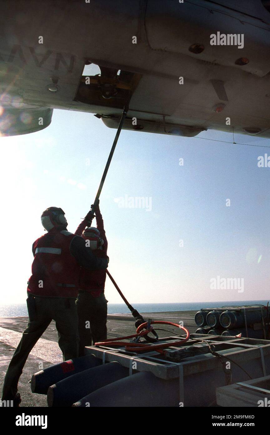 US Navy Aviation Ordnanceman Second Class Wayne Jones and US Navy ...