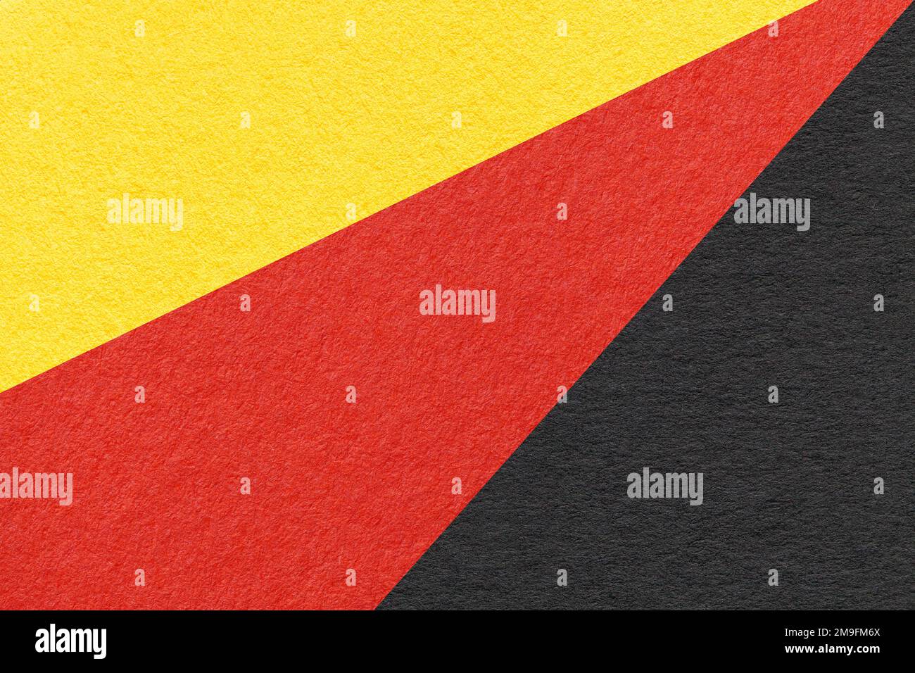 Texture of old craft yellow, red and black color paper background ...