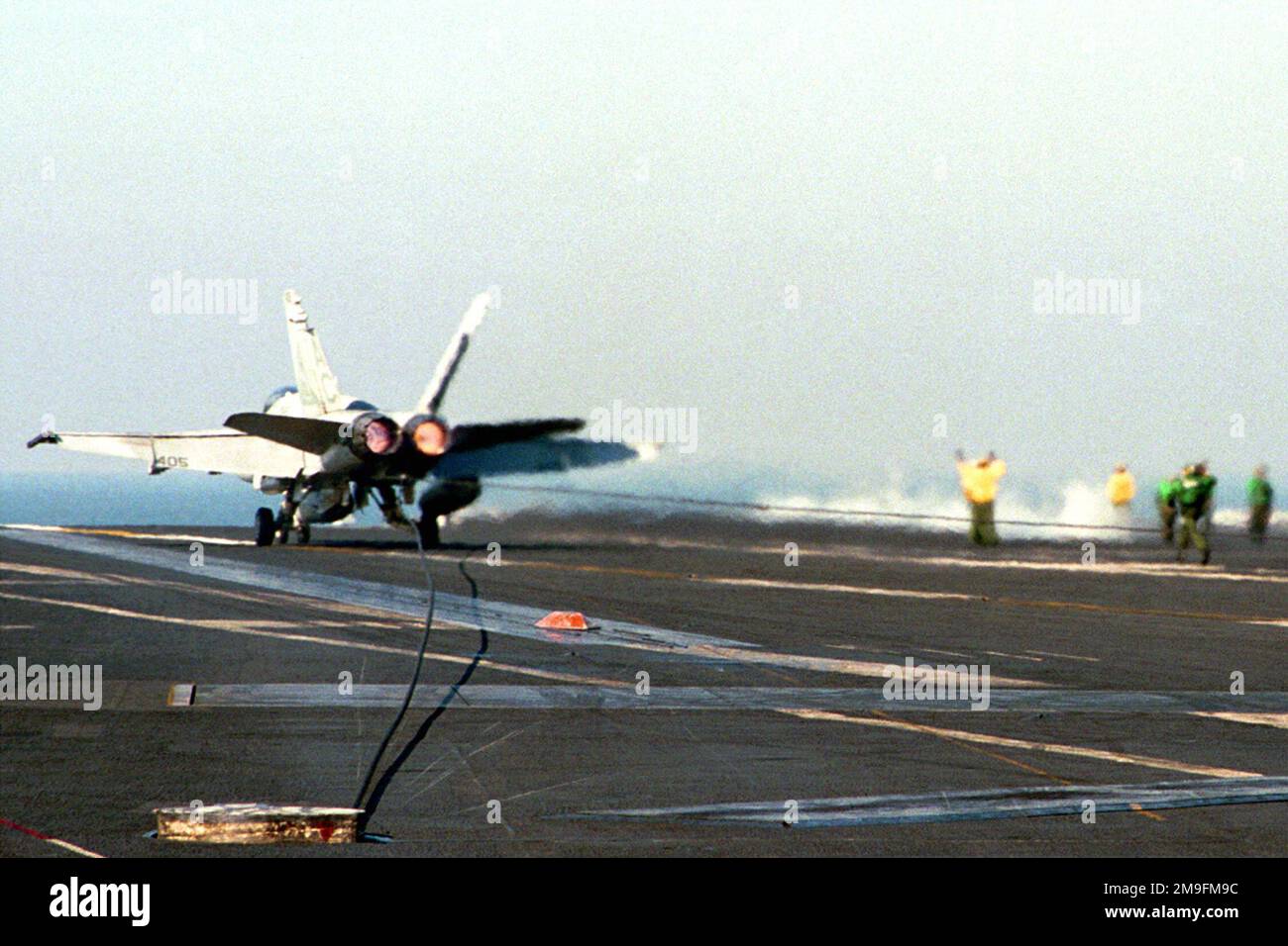 An F/A-18 Hornet aircraft from Strike Fighter Squadron One Zero Five ...