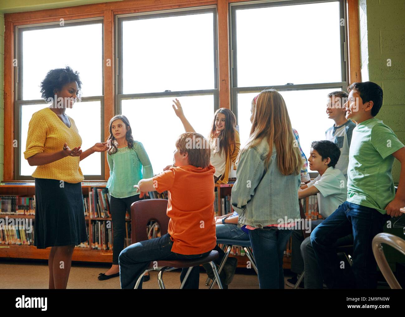 Learning, education and student with questions for teacher in middle ...