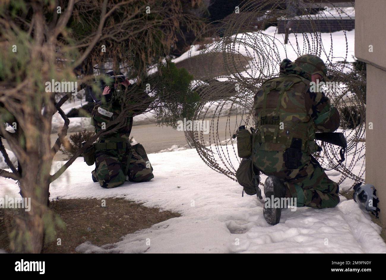 US Air Force Technical sergeant Bell surveys the perimeter of the 7th ...