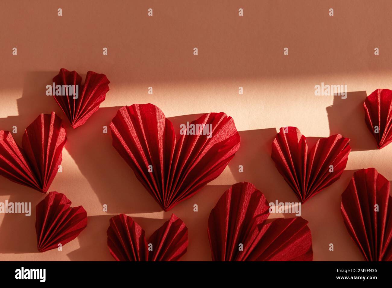 Valentines day flat lay. Stylish red hearts composition on pink paper ...