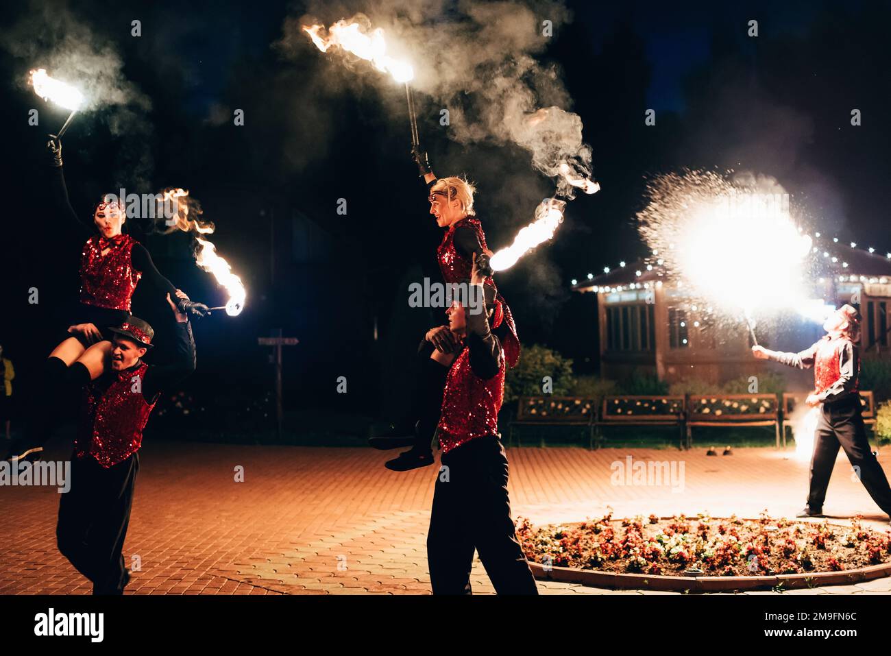 Professional dancers women fire show hi-res stock photography and ...