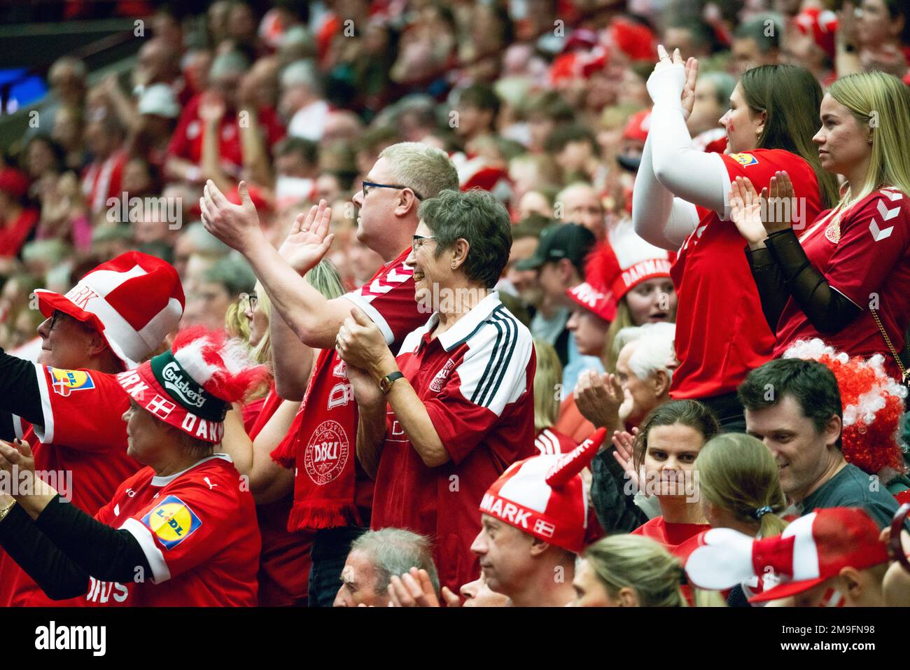 Malmo, Sweden. 17th Jan, 2023. Danish handball fans dressed in red and ...