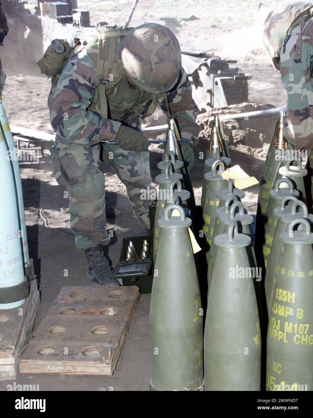 A Marine from Alpha Battery, Gun 3, 1ST Batallion, 12th Marines, stages ...