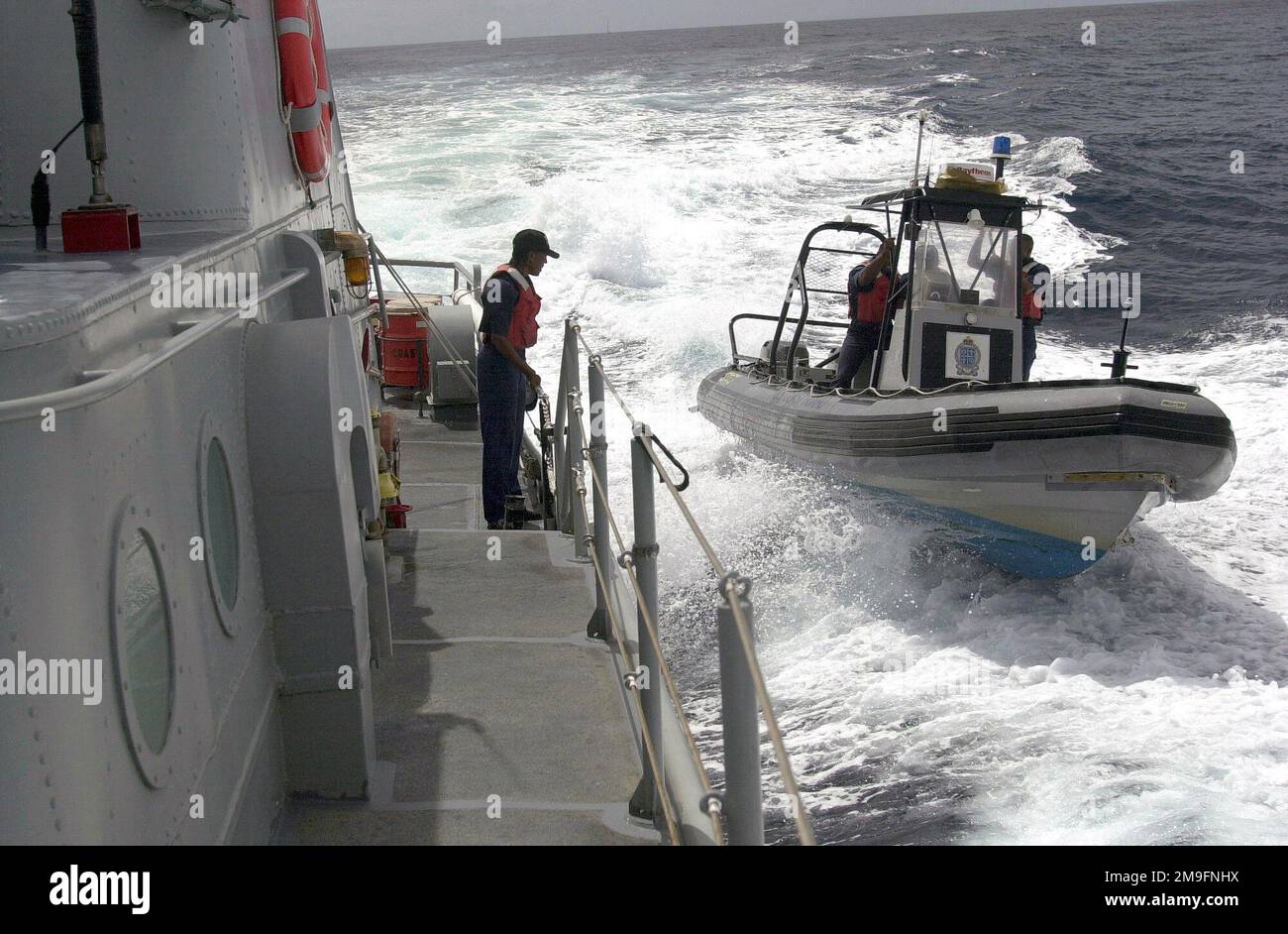 The Saint Lucian Coast Guard works on boat communication between the a ...