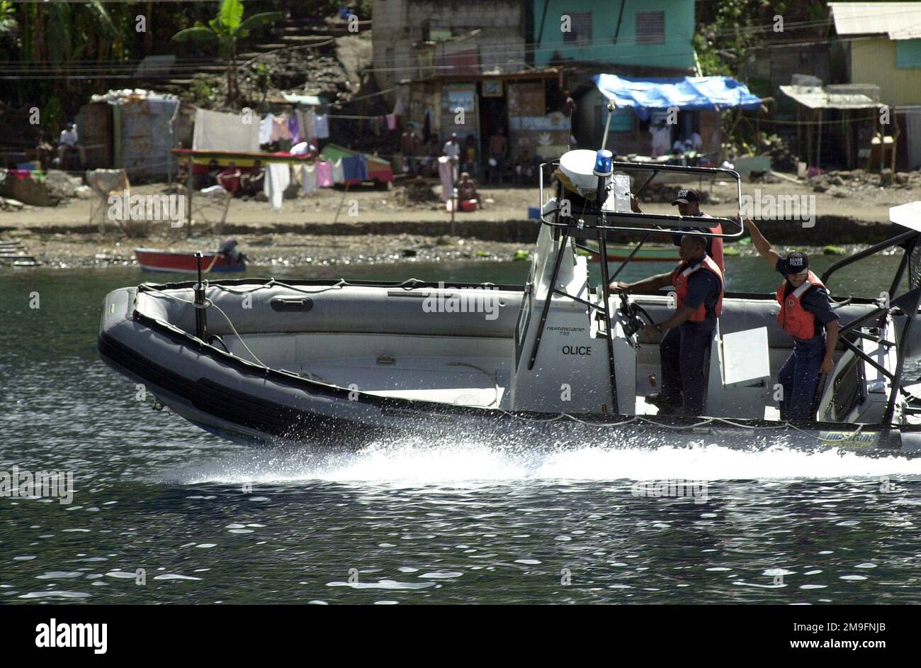 Members of the Saint Lucian Coast Guard work aboard their Rigid Hull ...