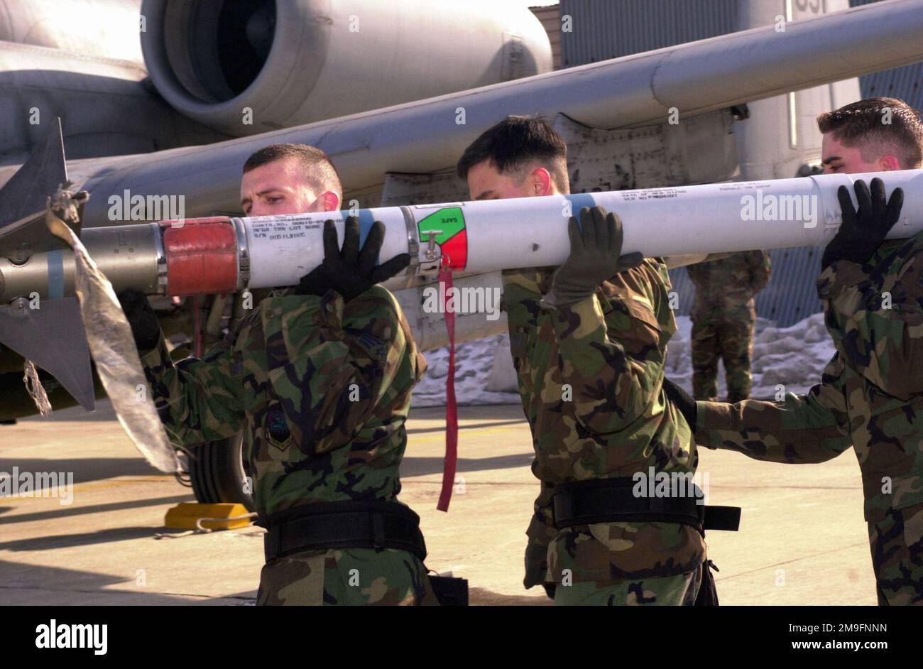 After all the bombs were loaded, members of the 25th Fighter Squadron ...