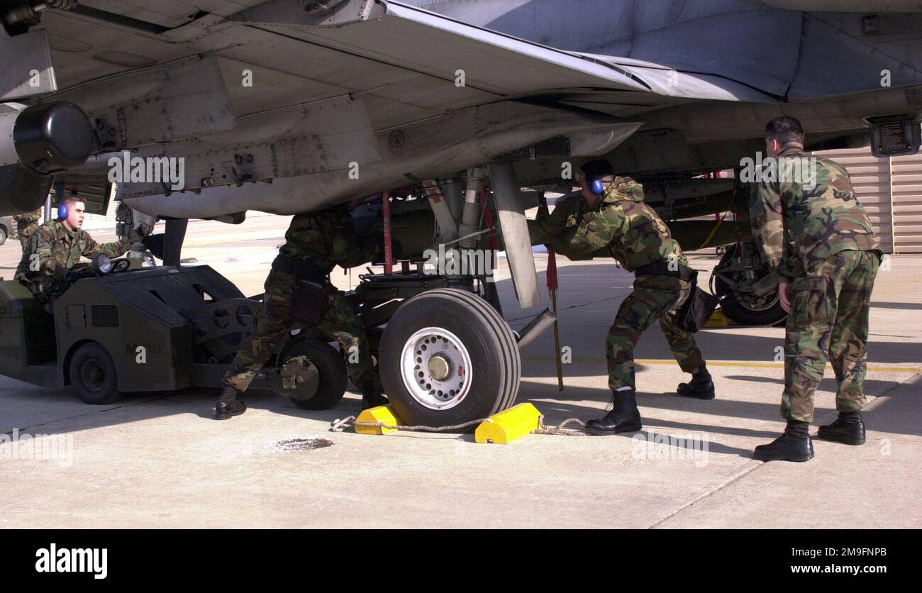 Under the watchful eye of safety inspectors, members of the 25th ...