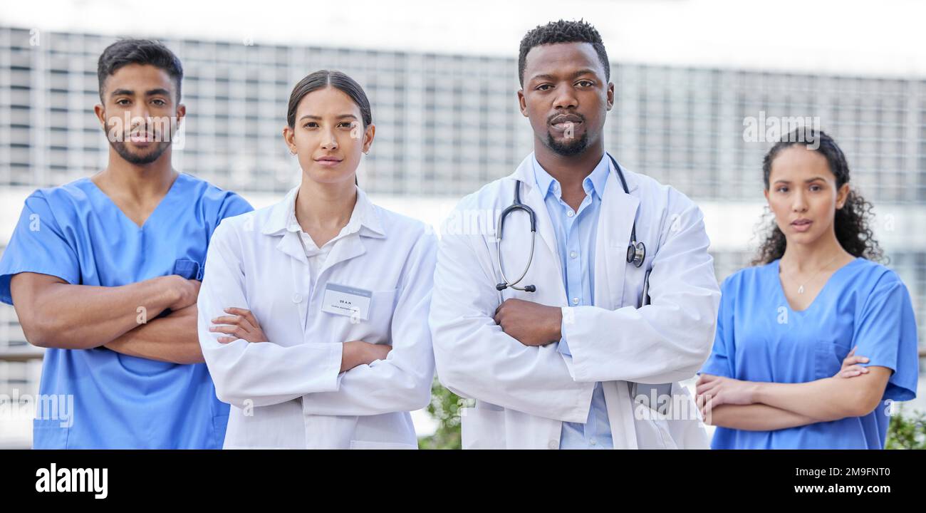 We take saving lives seriously. a group of doctors standing against a ...
