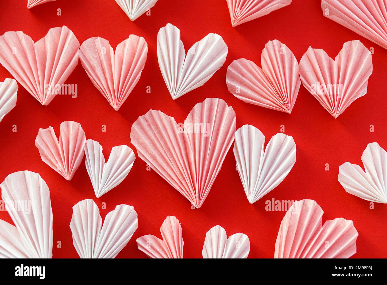 Valentines day flat lay. Stylish pink and white hearts composition on ...