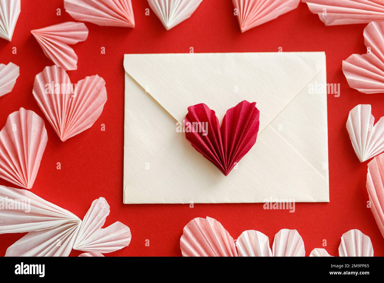 Happy Valentine's day! Stylish envelope with pink and red hearts flat ...