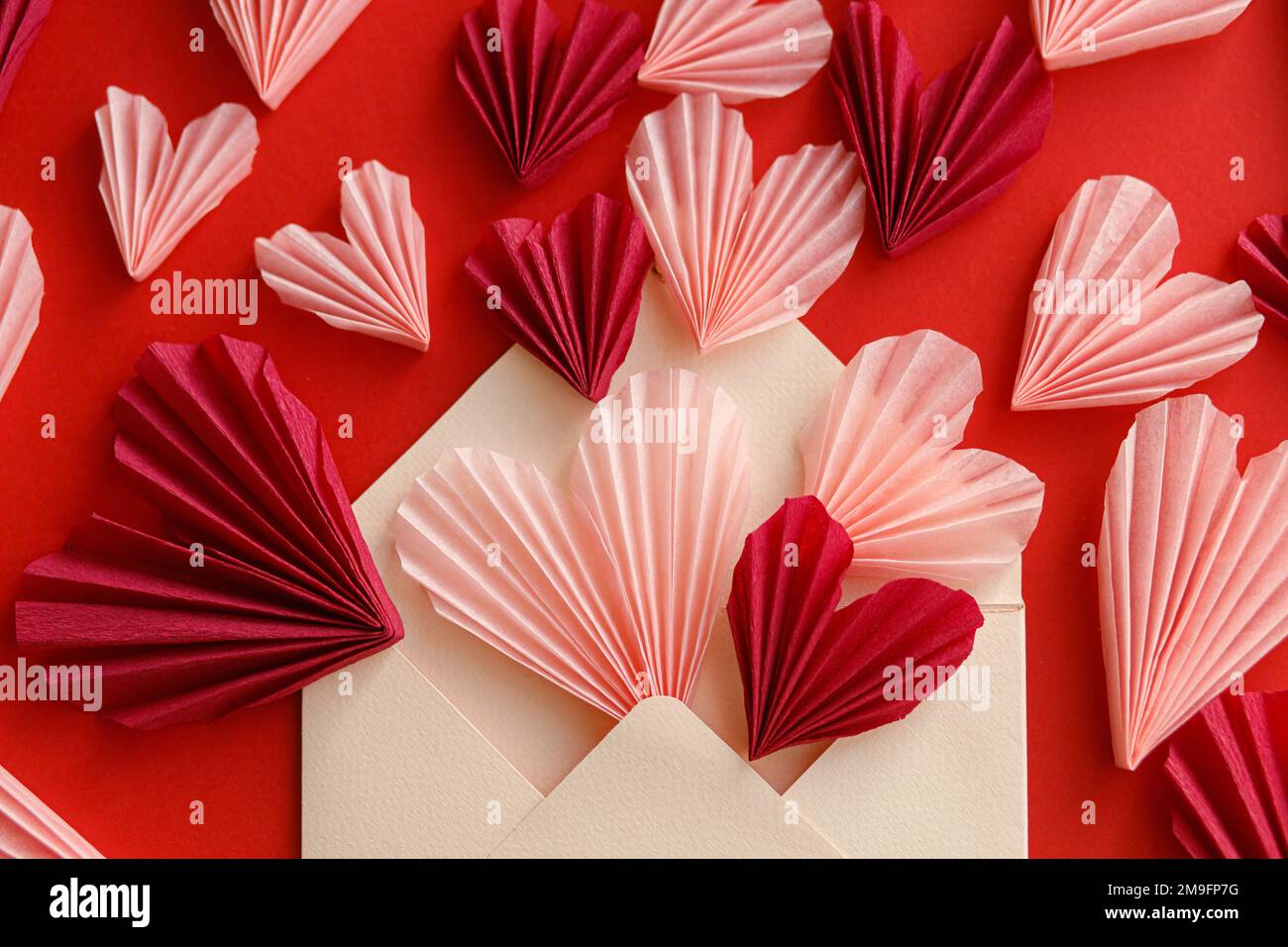 Happy Valentine's day! Stylish envelope with pink and red hearts flat ...
