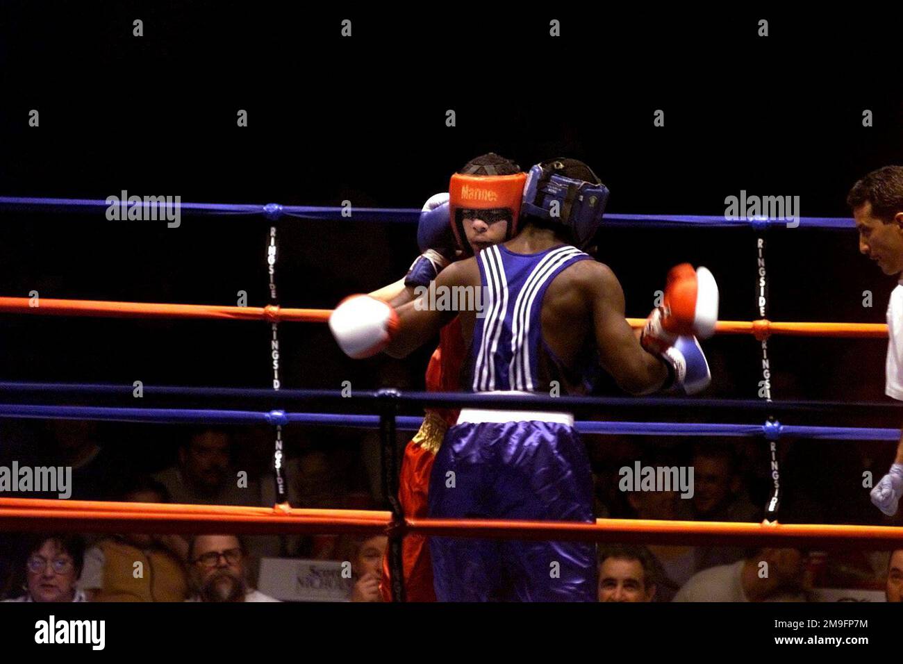 US Air Force boxer John Askew (Blue trunks) and US Marine Corps boxer ...