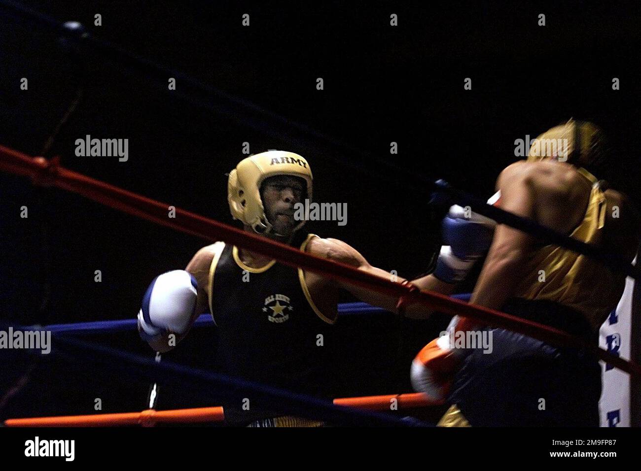 US Army boxer Julius Fogle (Left) and US Navy boxer Anthony Little ...