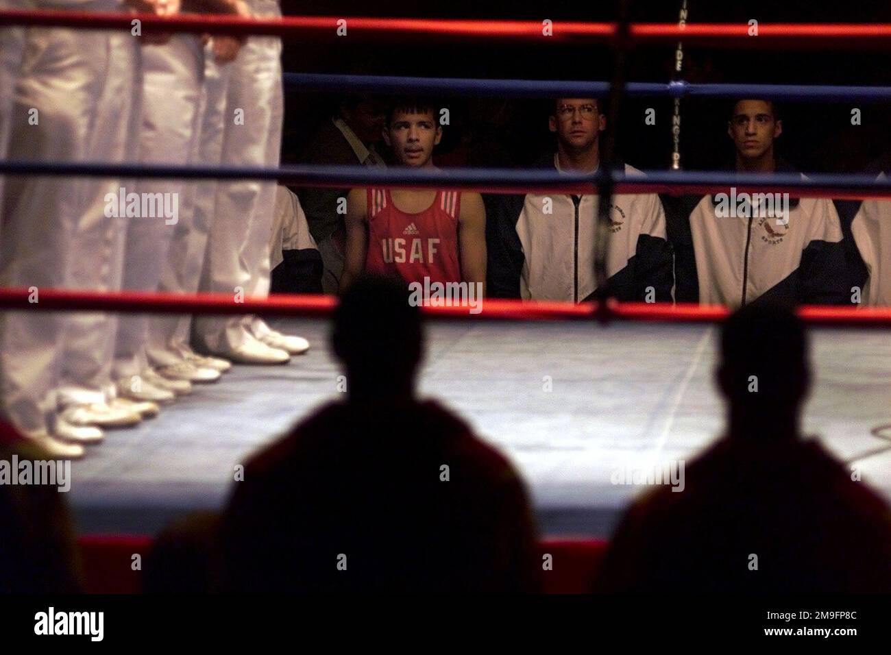 Members from the US Air Force boxing team stand outside the ring during ...