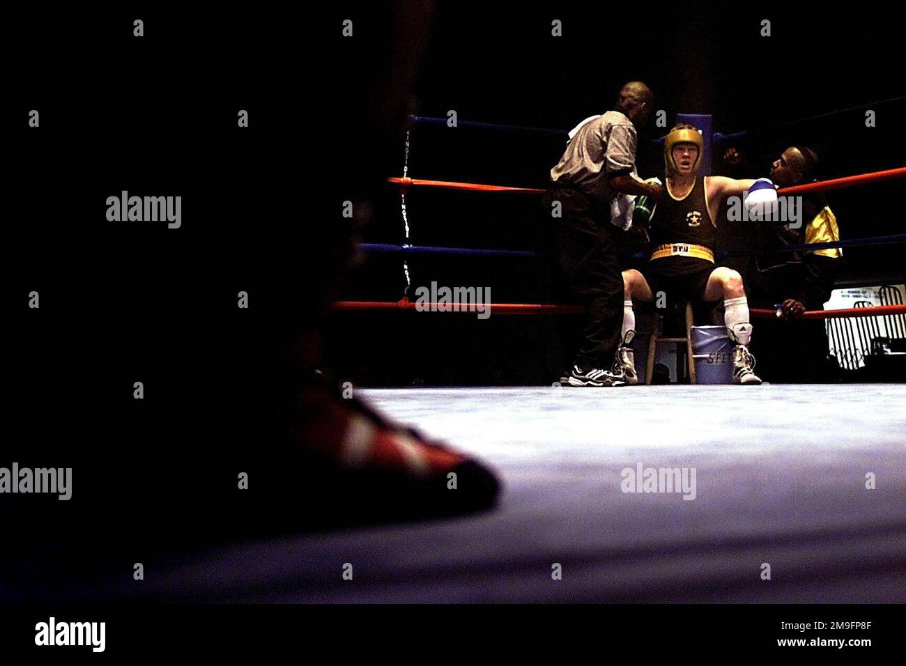 US Army boxer Marshall Christmas receives instruction from his corner ...